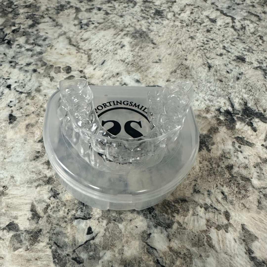 Essix Retainer With Tooth Replacement - SportingSmiles Dental