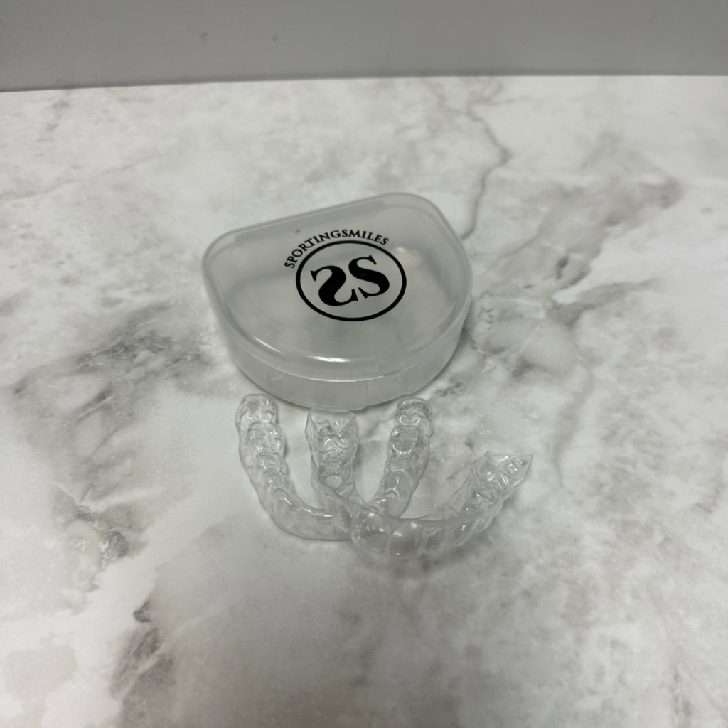 Do You Need a Fixed Retainer After Invisalign? - SportingSmiles Dental