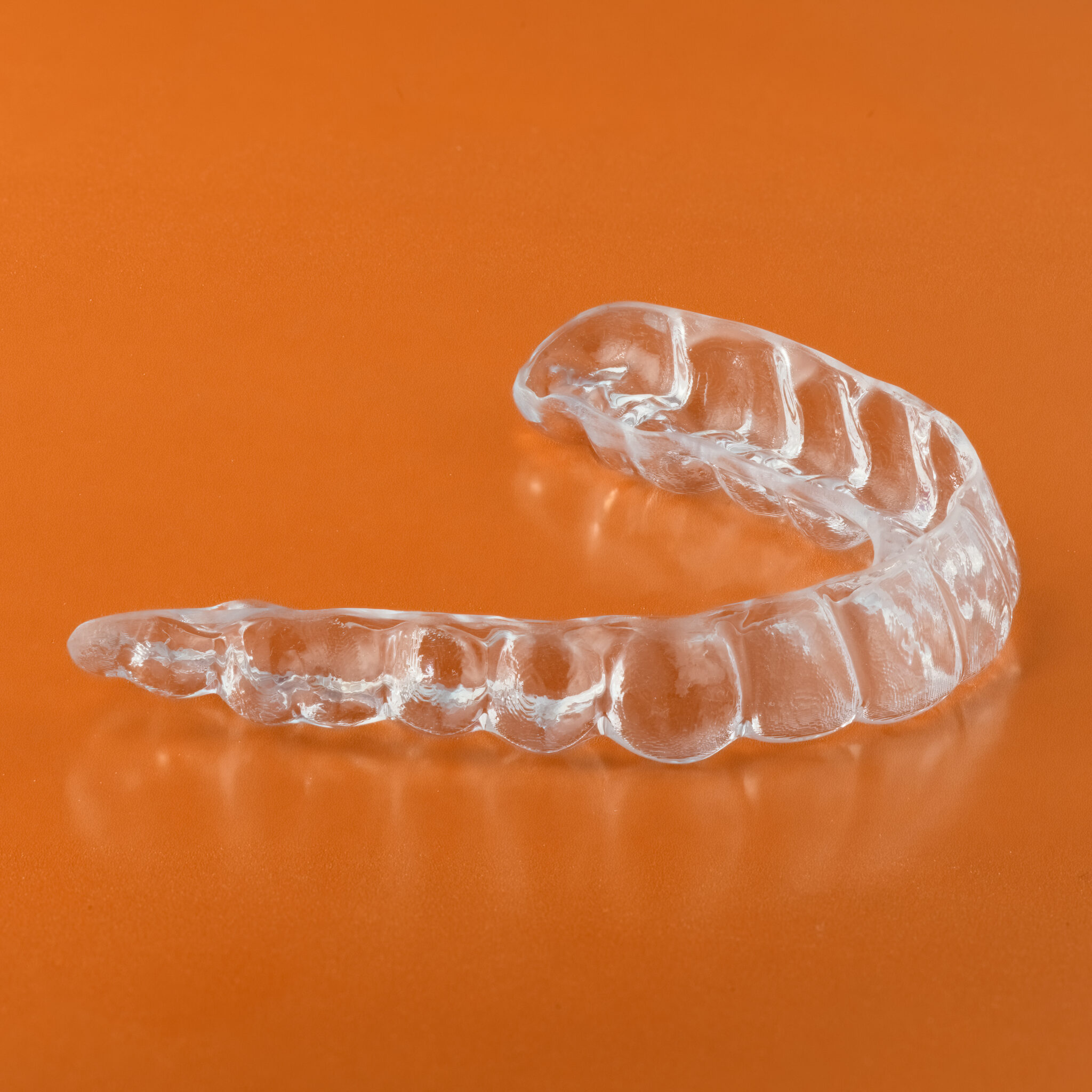 Can I Eat While Wearing My Retainer? - SportingSmiles Dental